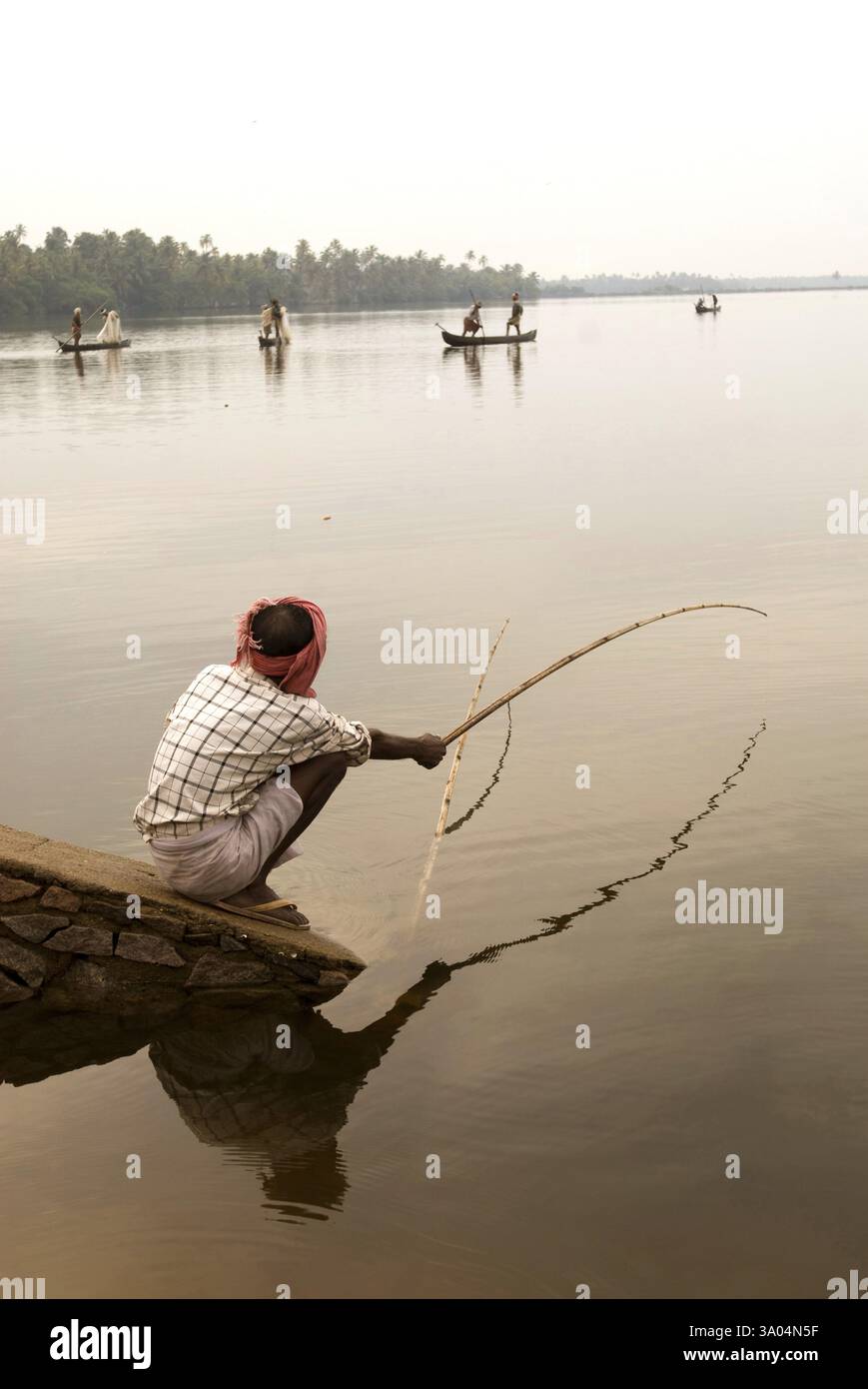 Fishing on backwaters of Cherai, Kerala, India, Asia Stock Photo - Alamy