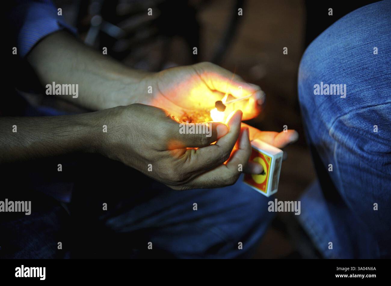 Hand light up marijuana, Kamathipura, Bombay Mumbai, Maharashtra, India ...