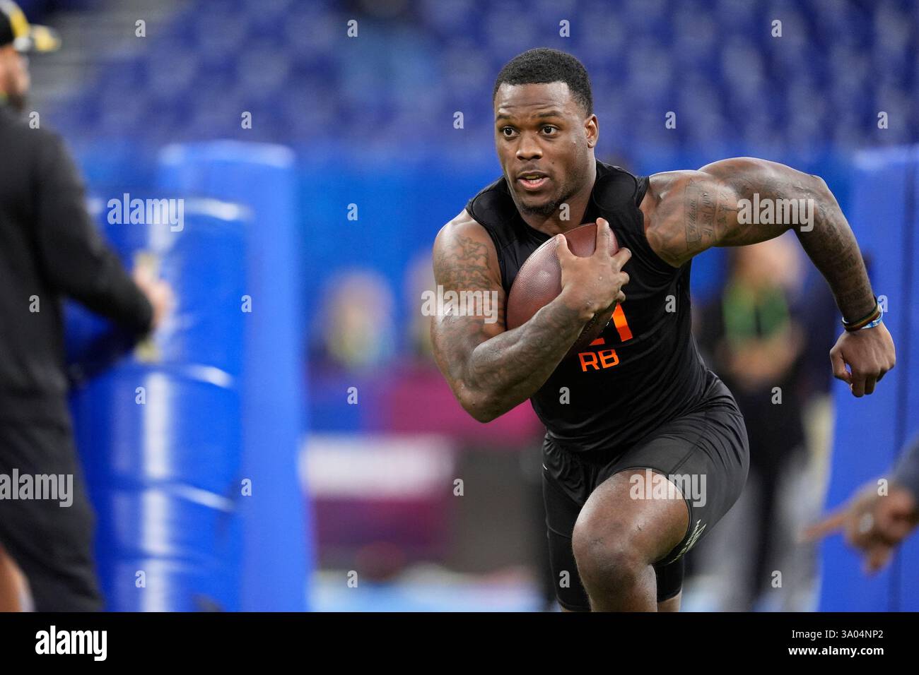 Southern California running back Woody Marks runs a drill at the NFL ...