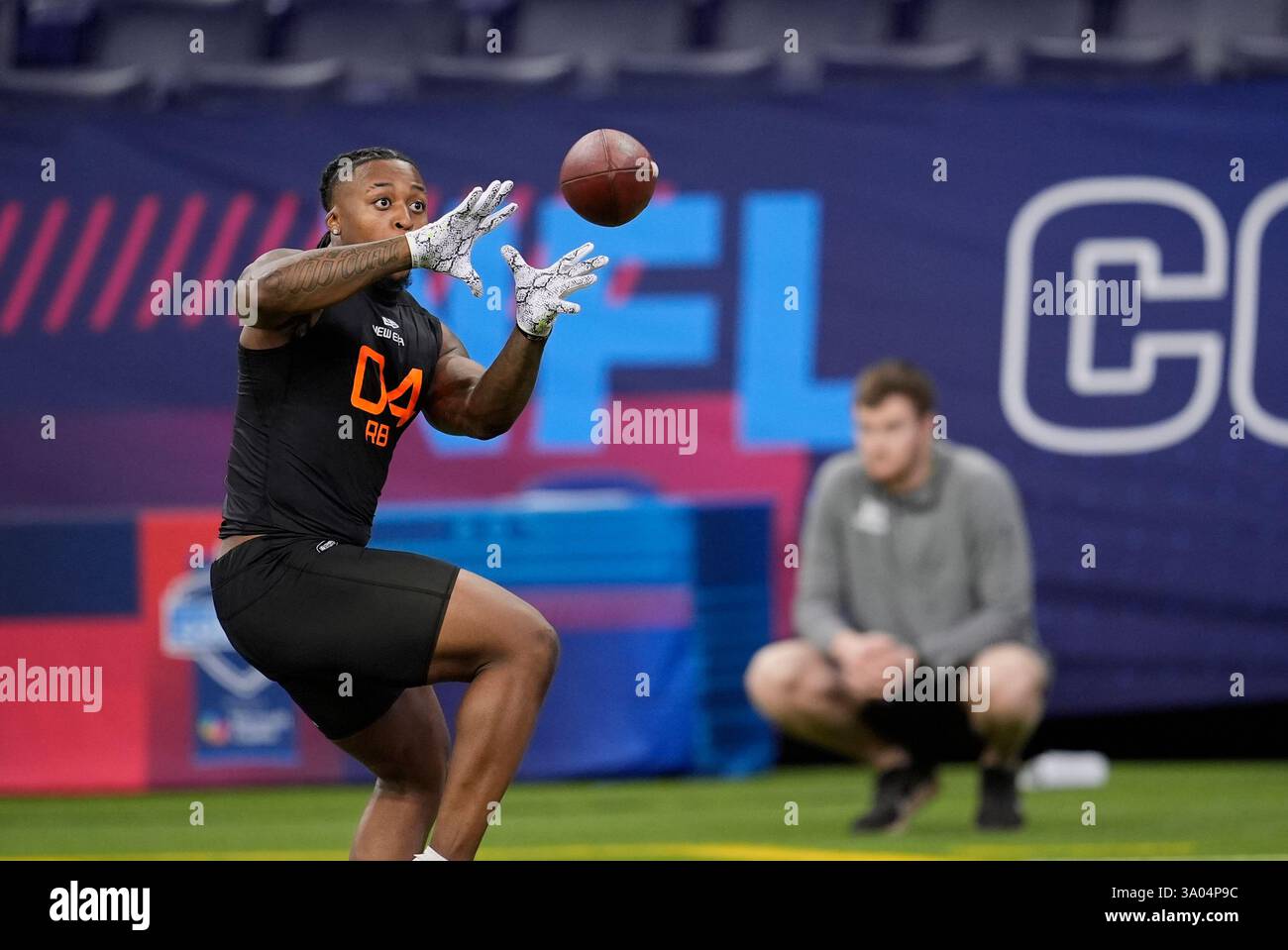 Texas Tech running back Tahj Brooks runs a drill at the NFL football ...