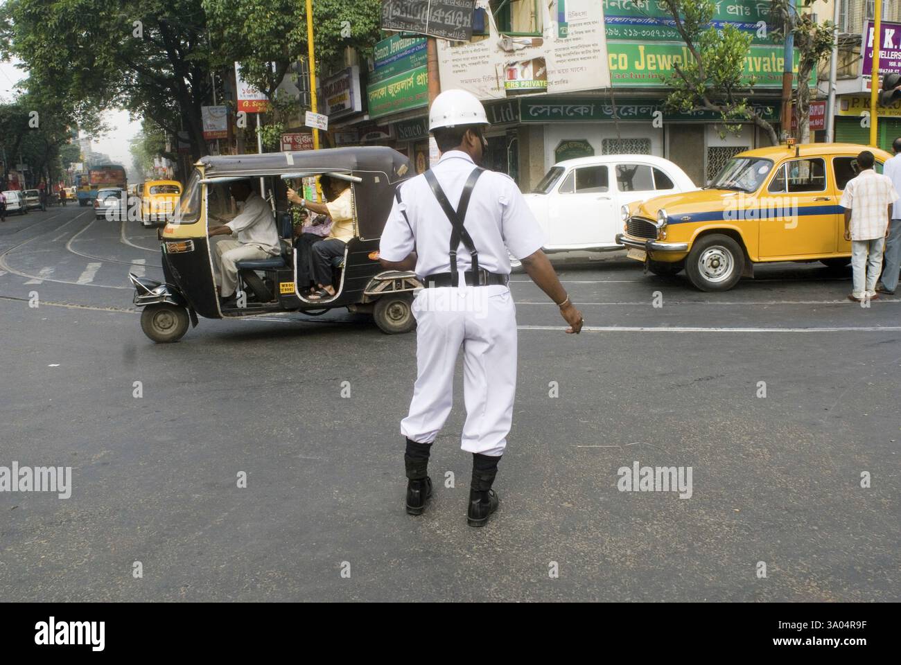 Traffic police Controlling Traffic on street of Kolkata, West Bengal ...