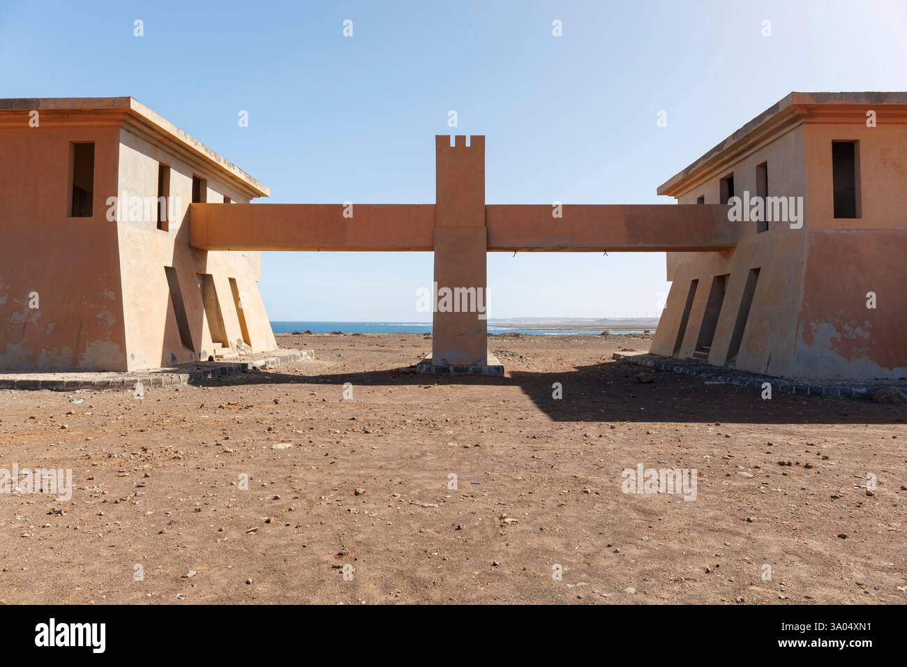 Abandoned building overlooking the sea in a desert landscape on the Sal ...