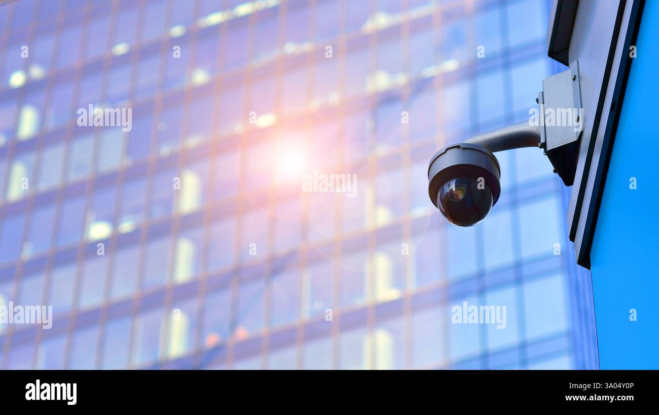 CCTV camera front of office building Stock Photo - Alamy
