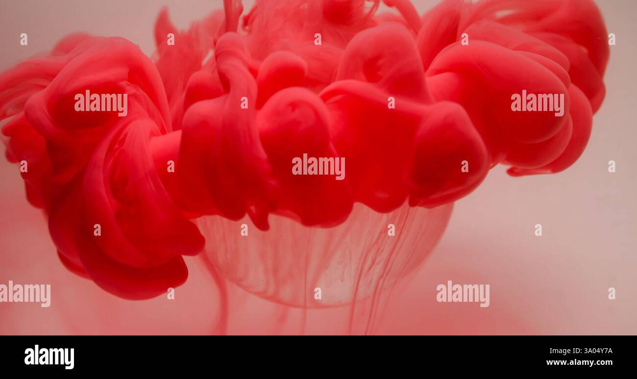 Paint cloud. Flow ink. Defocused red color smoke texture fluid splash ...