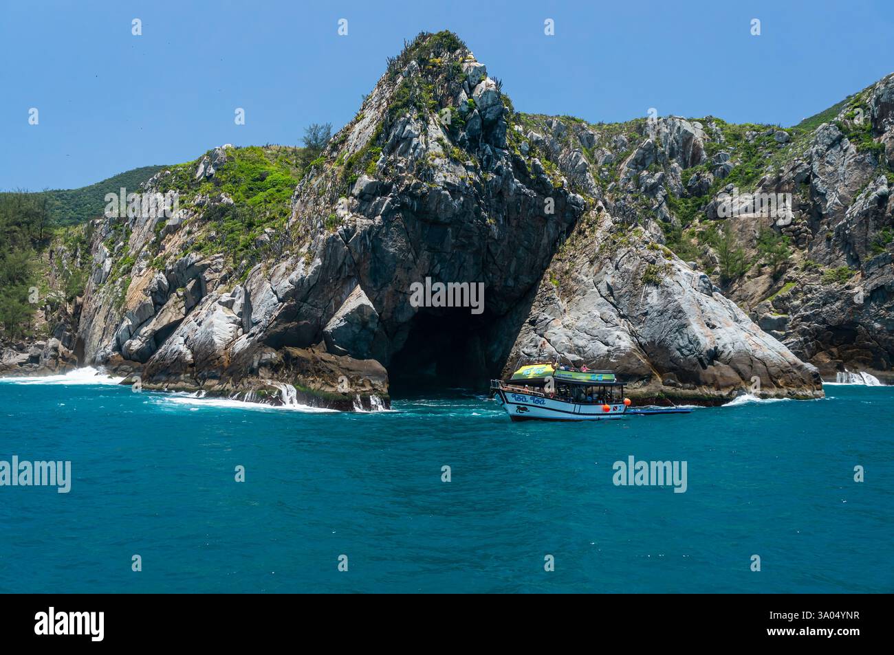 Front view of the triangle shaped Gruta Azul (Blue Cave) on Ilha do ...