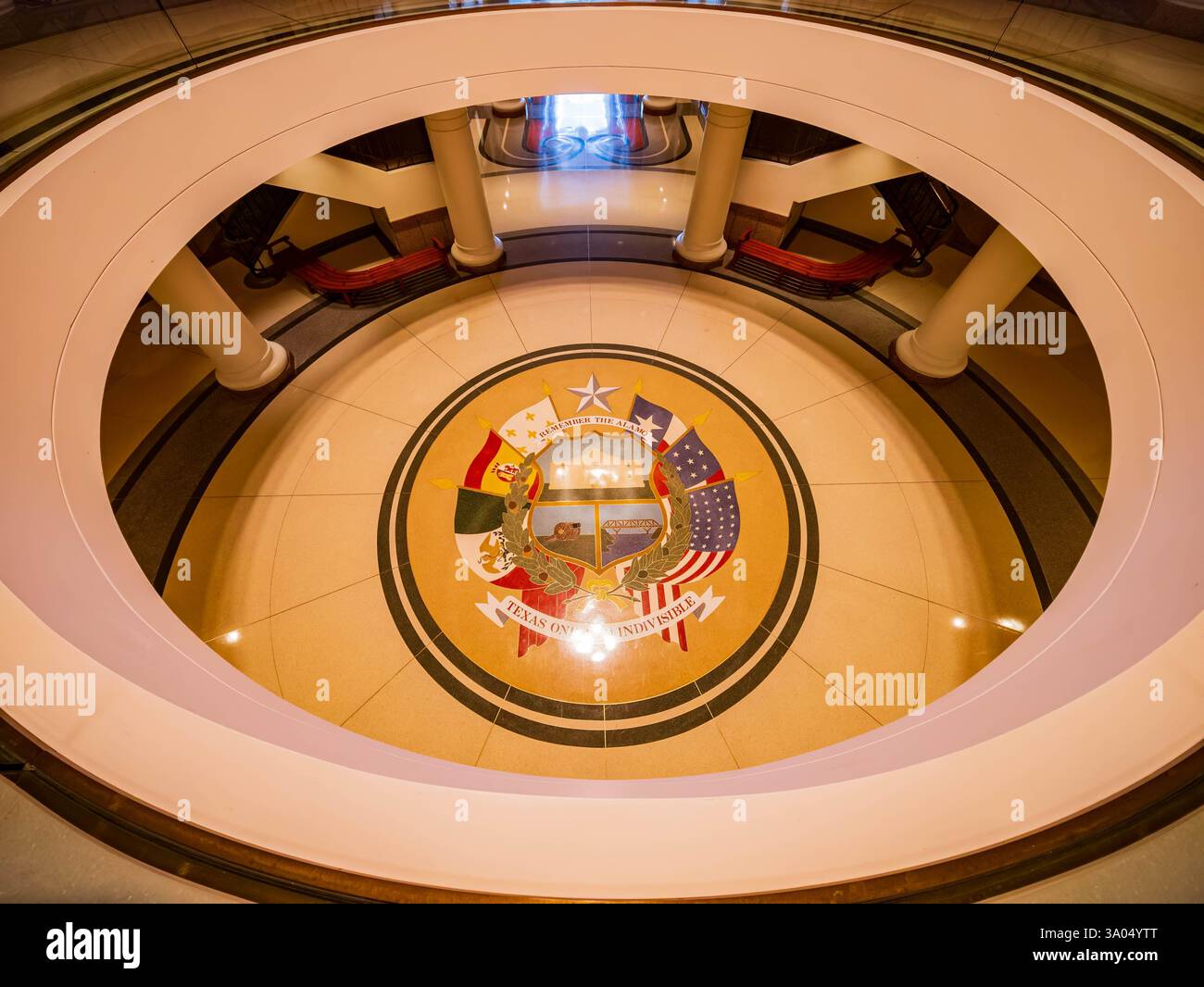 Interior view of the Texas Capitol with visitors exploring the halls at ...