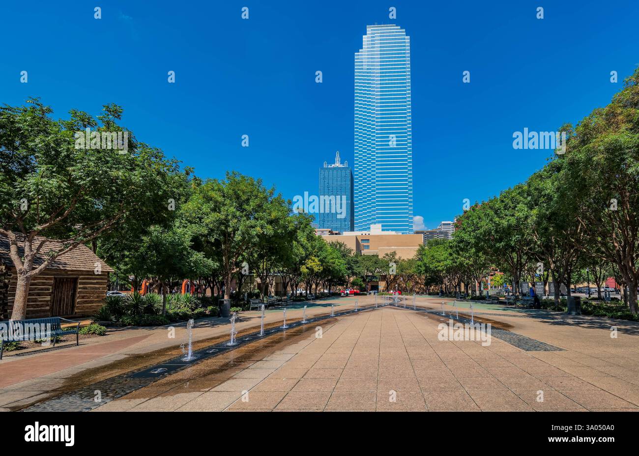 Sunny exterior view panning up of the Founders Plaza at Texas Stock ...