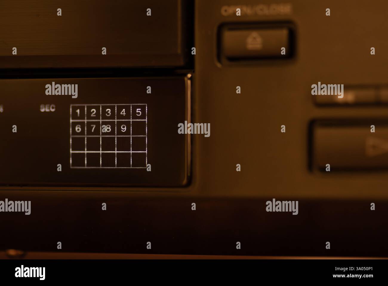 Retro-styled compact disc player with detailed close-up of control ...