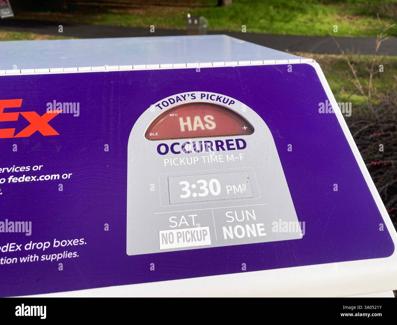 Close up of a FedEx drop box showing the pickup status indicator, with ...