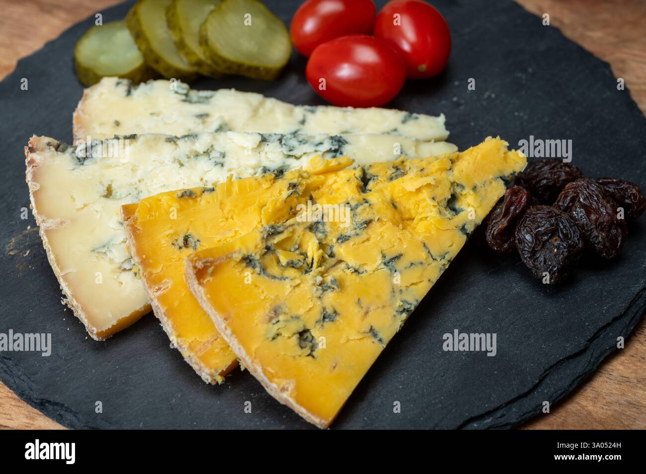 Cheese plate, English cow milk semi-soft, crumbly blue stilton and blue ...