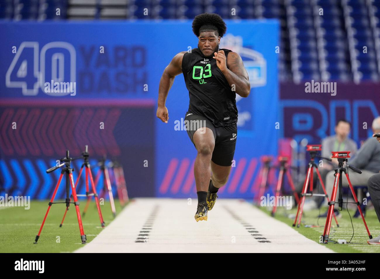 Alabama offensive lineman Tyler Booker runs the 40-yard dash at the NFL ...