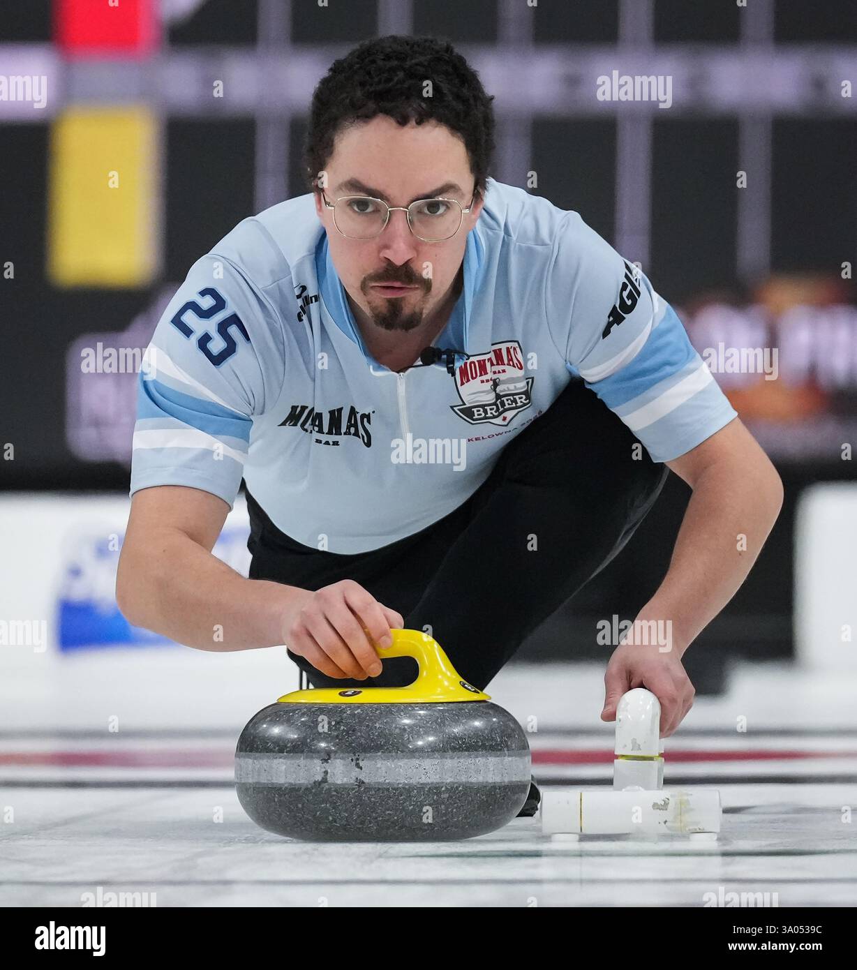 Quebec skip Felix Asselin delivers a rock while playing Yukon during ...