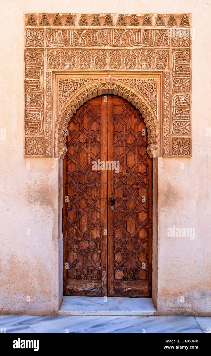 Intricately Carved Wooden Door with Geometric Patterns and Arabic ...
