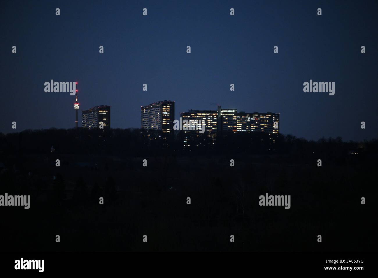 Stuttgart, Germany. 02nd Mar, 2025. Windows are lit up in buildings in ...