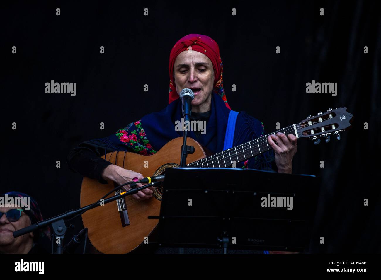 Madrid, Spain. 2nd Mar, 2025. A woman dressed in a traditional costume ...