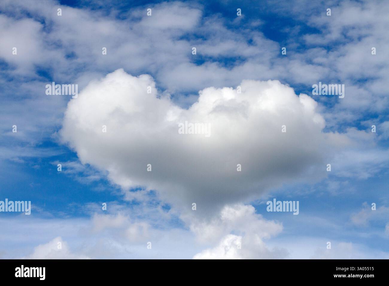 heart shaped cloud flies beautifully across the sky Stock Photo - Alamy