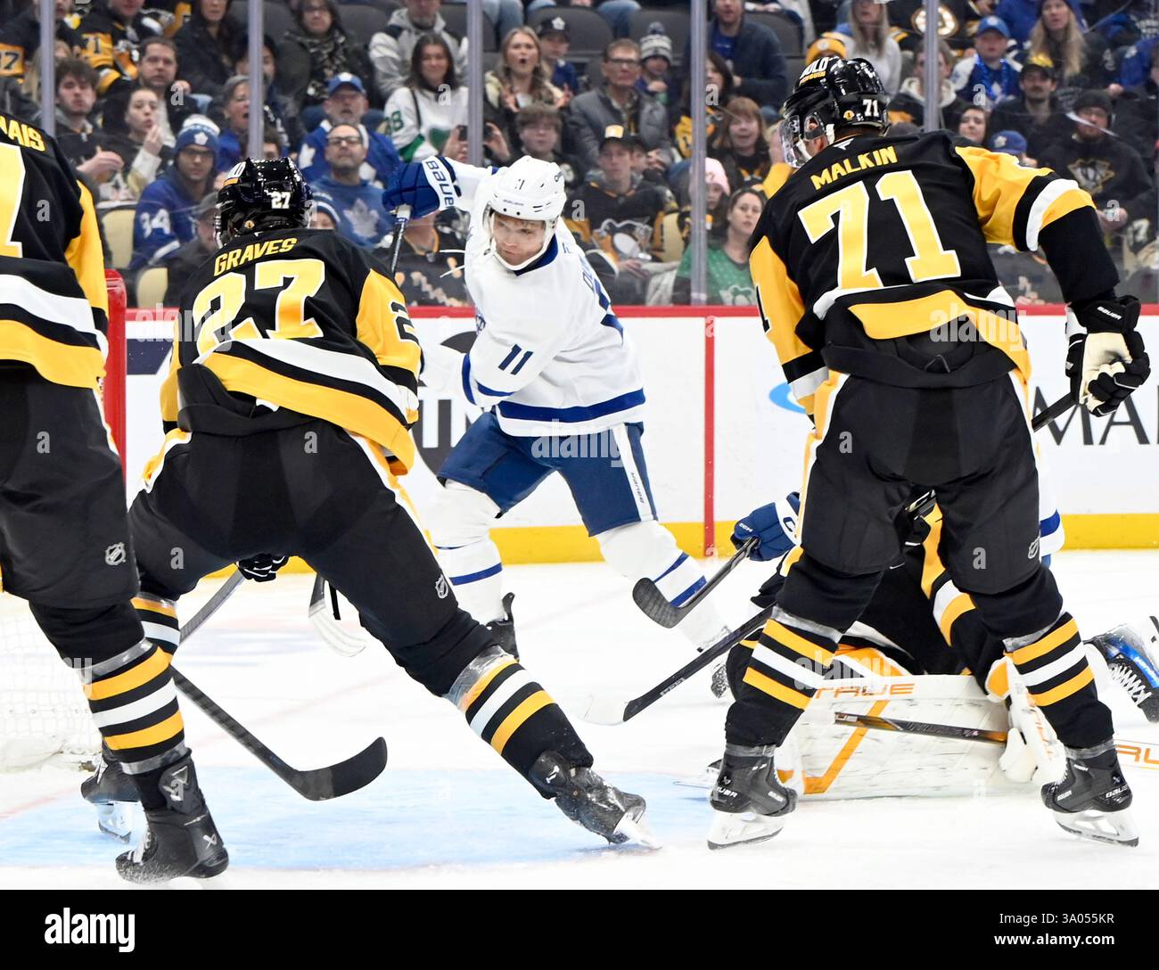 Toronto Maple Leafs center Max Domi (11) scores on a shot early in the ...
