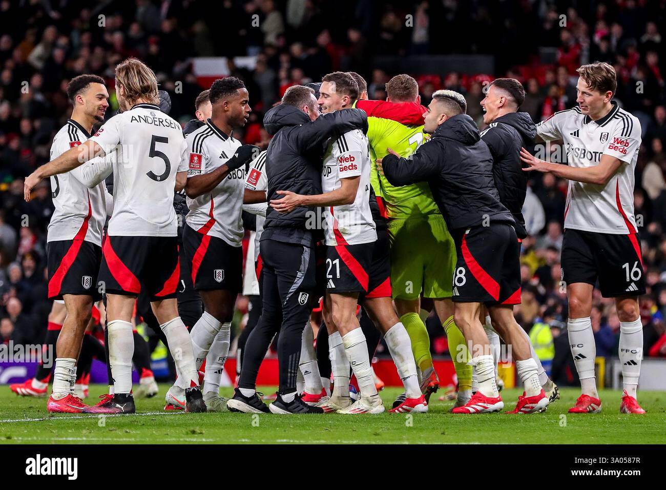 Fulham players celebrate their penalty shootout victory after Bernd Leno of Fulham saves a ...