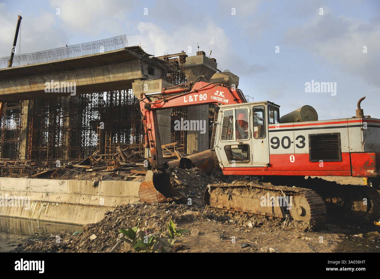 Excavator at construction site of bridge, Bombay Mumbai, Maharashtra ...