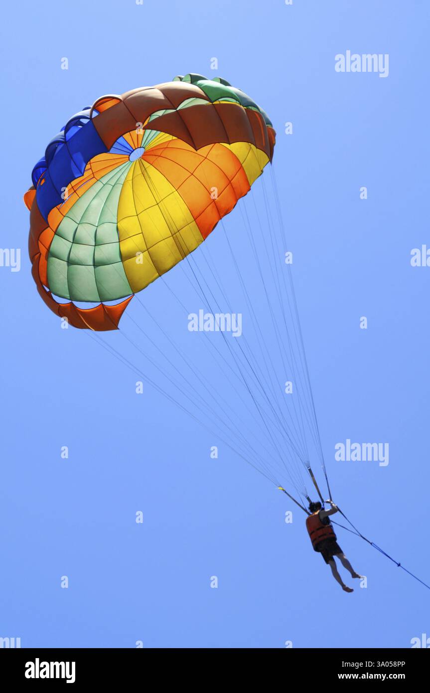 Parasailing in blue sky at Pattaya Island, Thailand, Asia Stock Photo ...