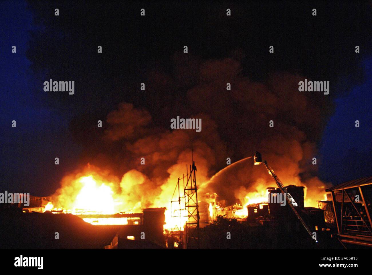 Firefighters dousing fire using snorkel in Behrampada slum, Bandra ...