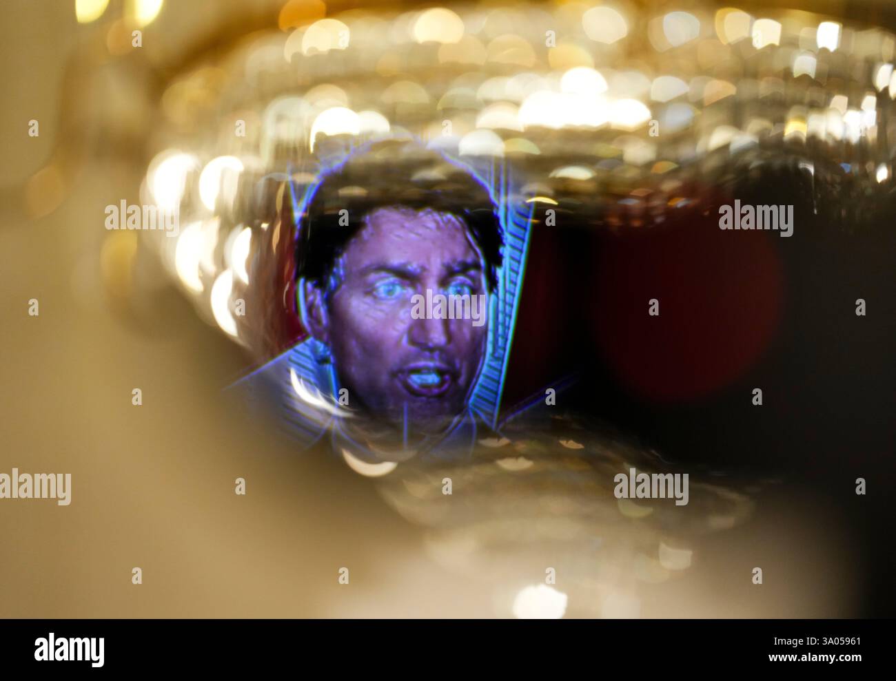 Prime Minister Justin Trudeau is seen in the view finder of a TV camera ...