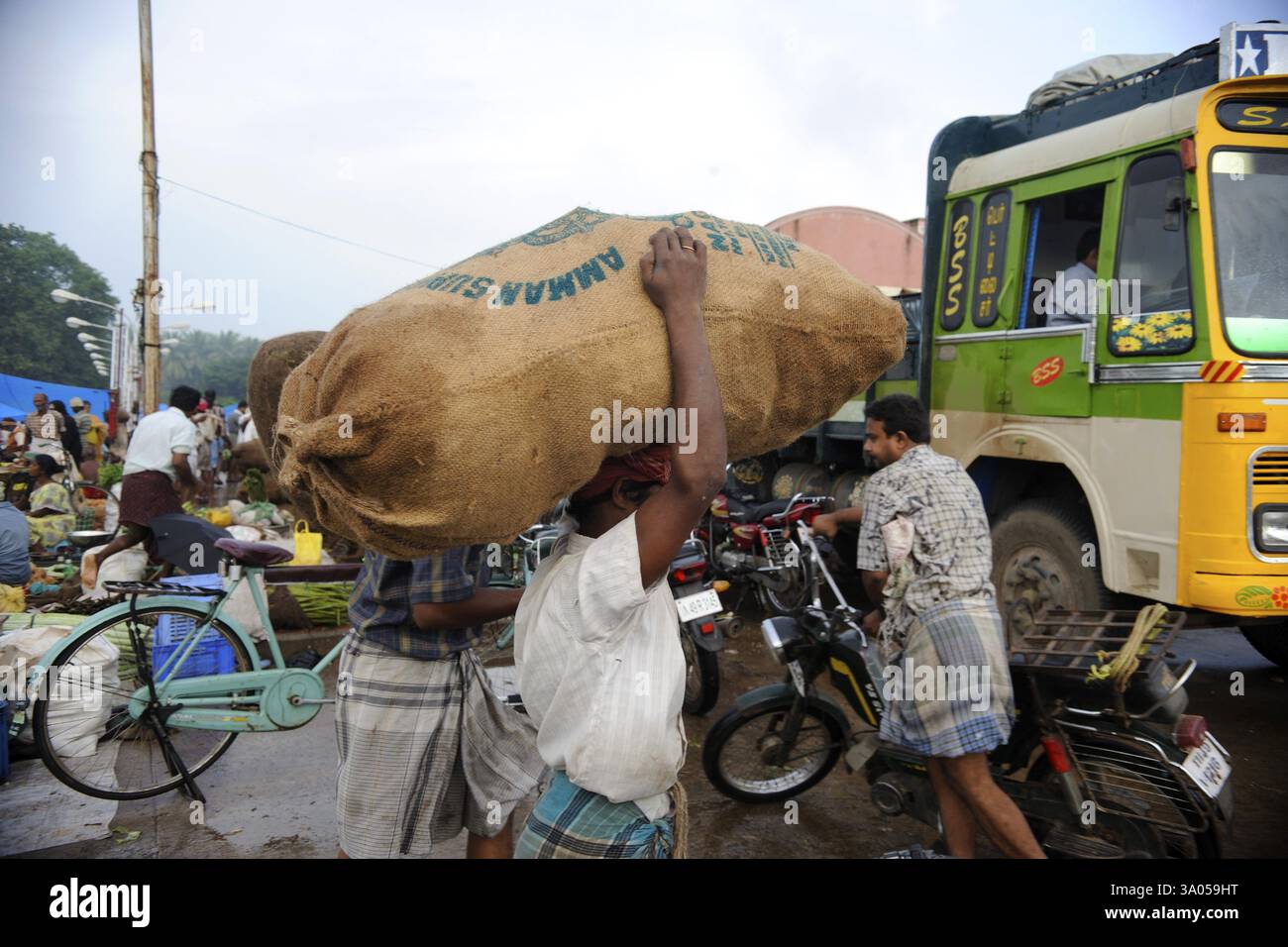 Man carrying jute sack, Thanjavur, Tamil Nadu, India, Asia Stock Photo ...