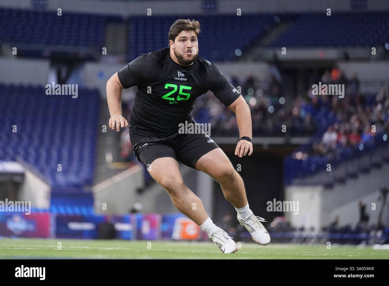 Texas offensive lineman Jake Majors runs a drill at the NFL football ...
