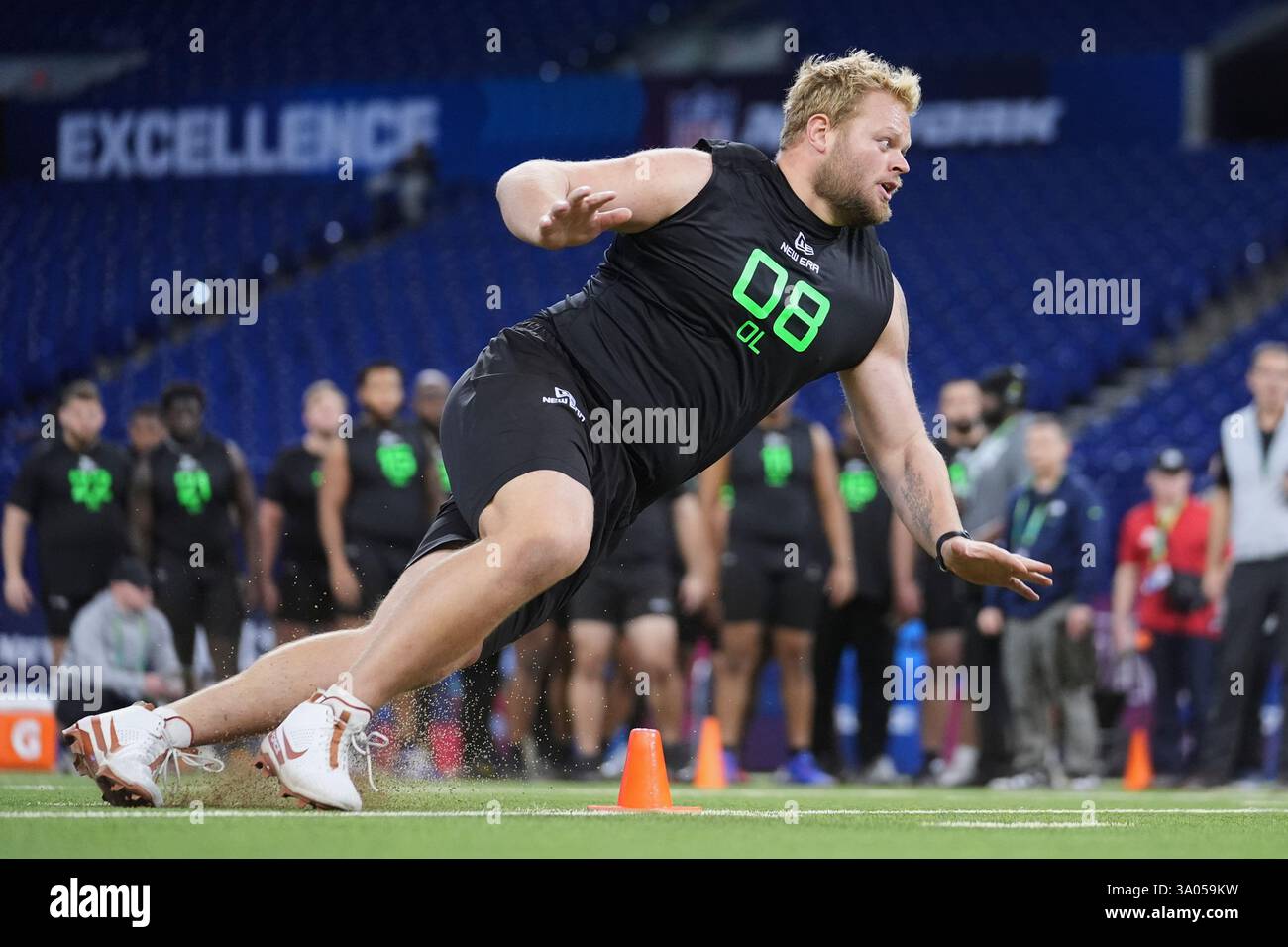Texas offensive lineman Hayden Conner runs a drill at the NFL football ...