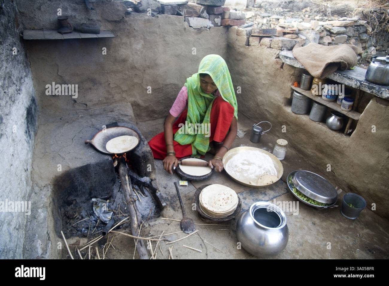 Indian rural woman making chapaati bread, household work, Village ...