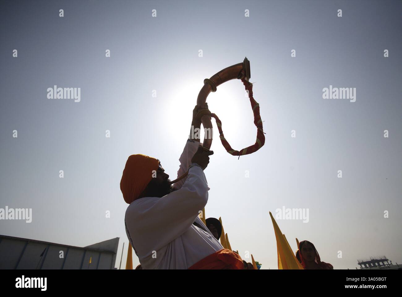 Sikh devotee blowing tutari trumpet start of cultural events ...