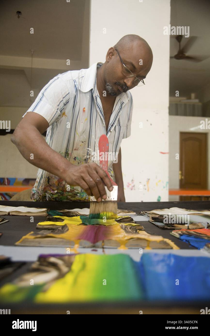 Indian contemporary artist Bose Krishnamachari in his studio working on ...