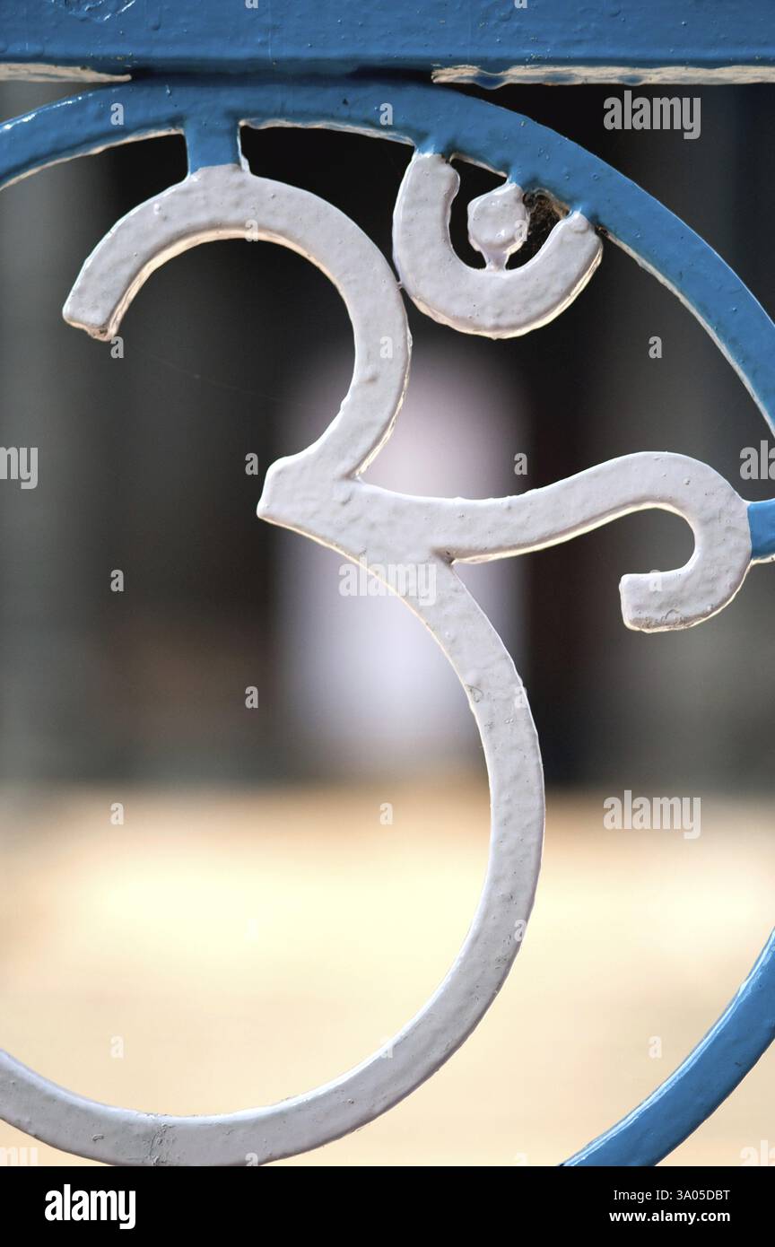 Om symbol in metal Stock Photo - Alamy