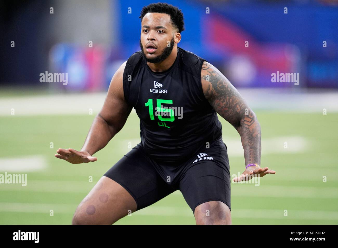 LSU offensive lineman Miles Frazier runs a drill at the NFL football ...