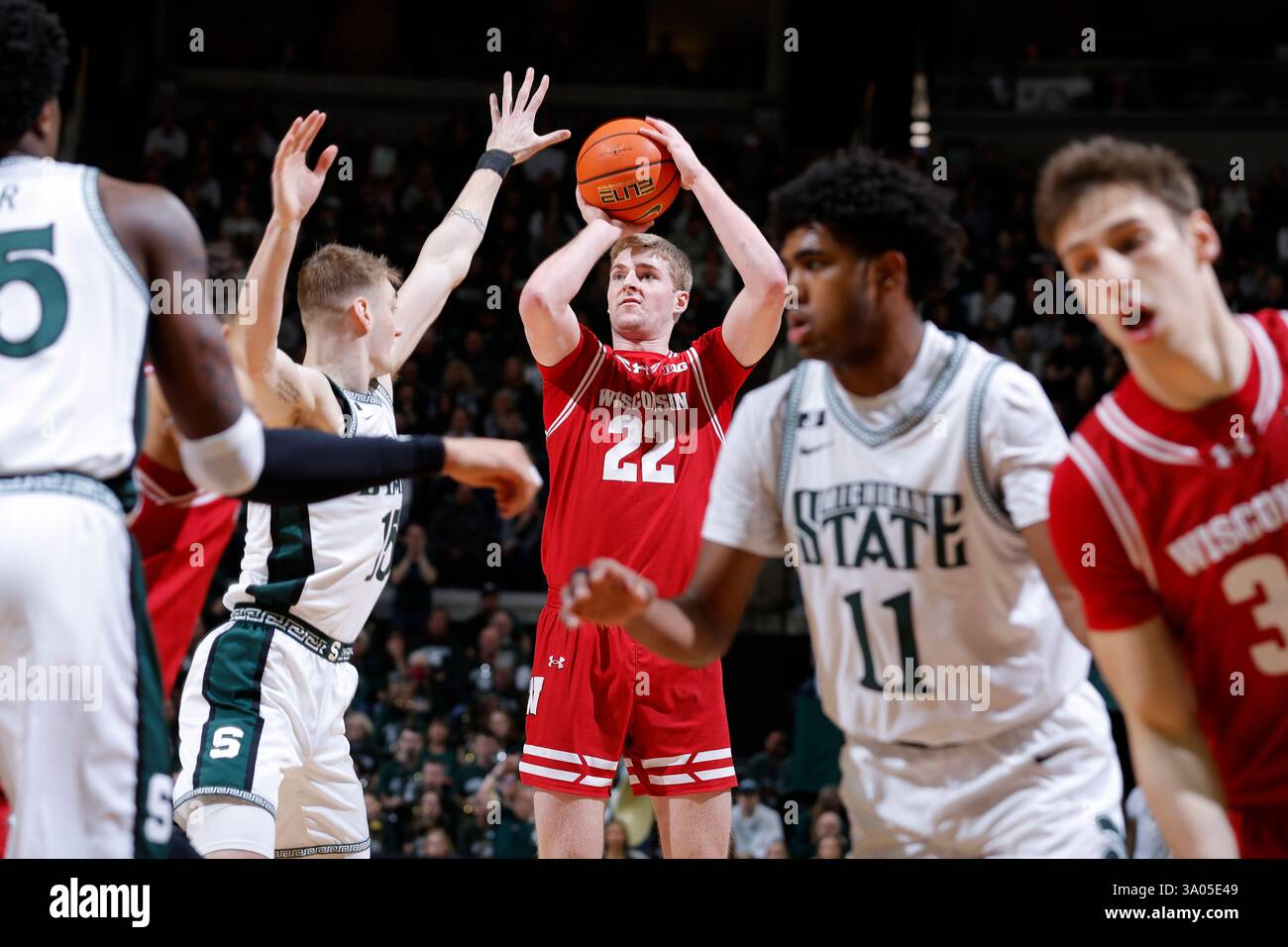 Wisconsin forward Steven Crowl (22) looks to shoot against Michigan ...