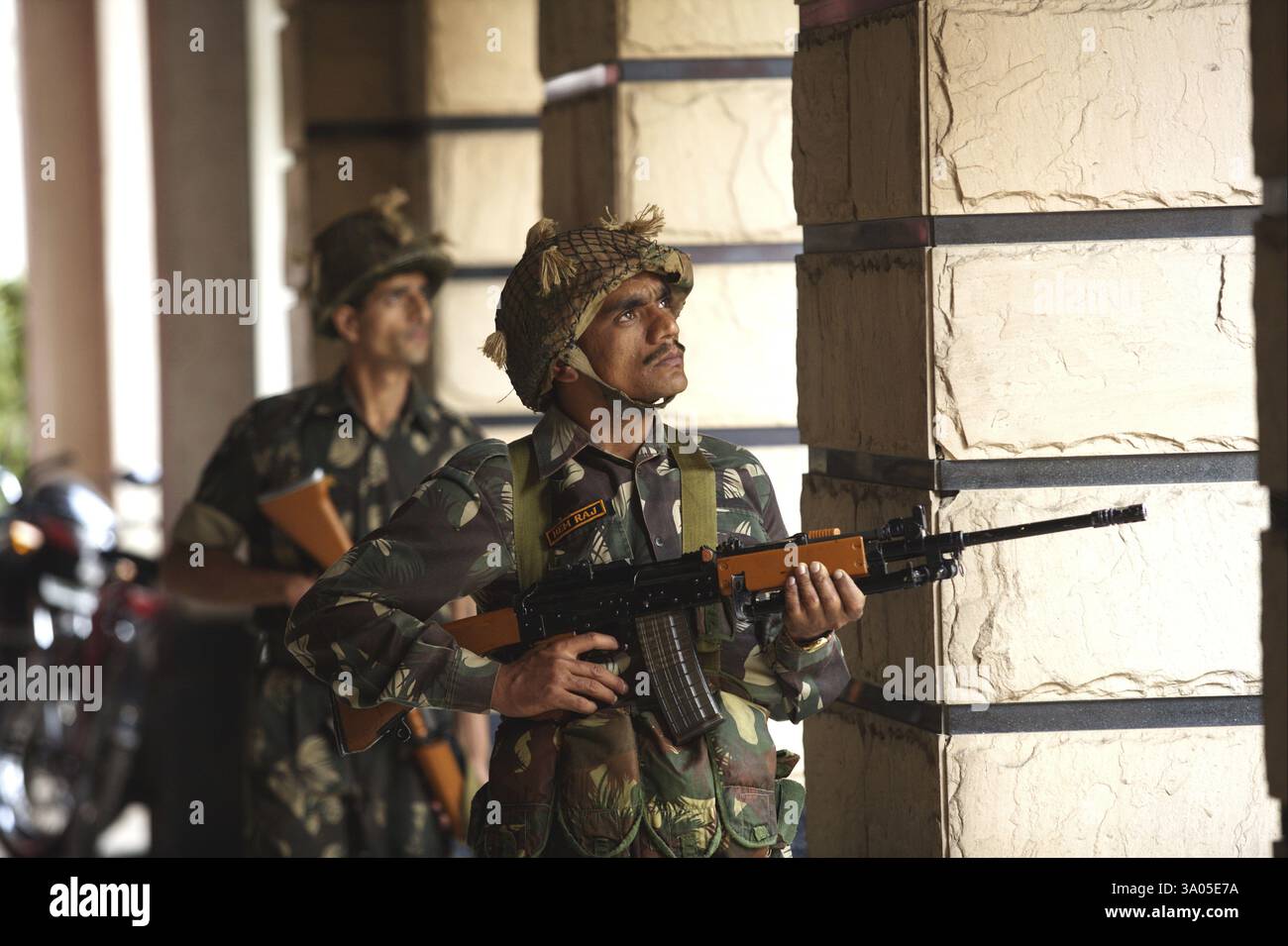 Indian army personnel taking position Taj Mahal hotel during terrorist ...