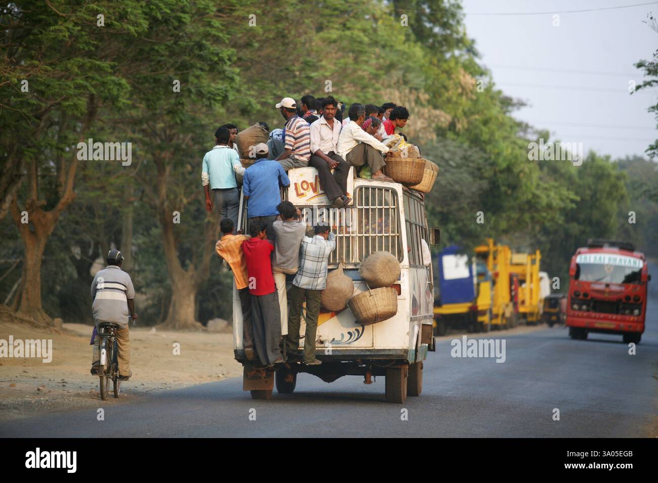 Passengers sitting on top of bus used local transport system in ...