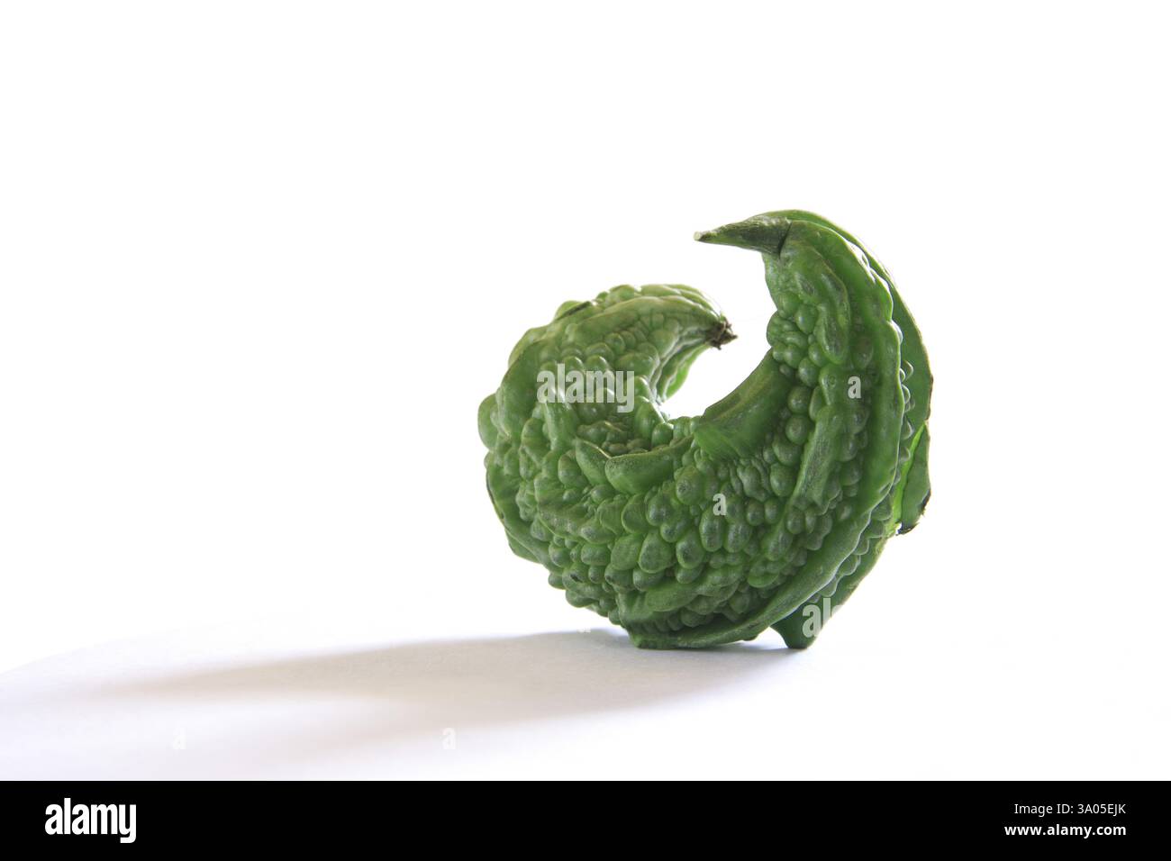 Green vegetable, karela bitter gourd momordica charantia on white ...