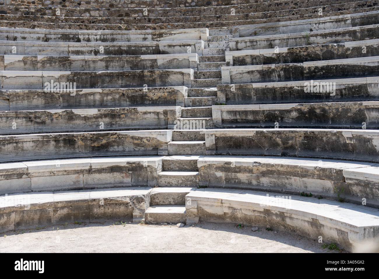 Steps leading between the marble terrace seats in Roman Odeon ...