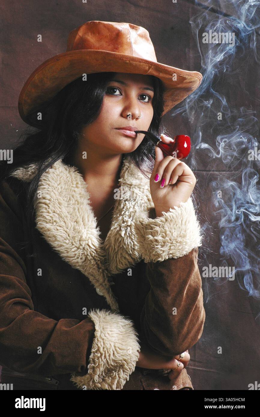 Lady smoking cigar MR#769E Stock Photo - Alamy