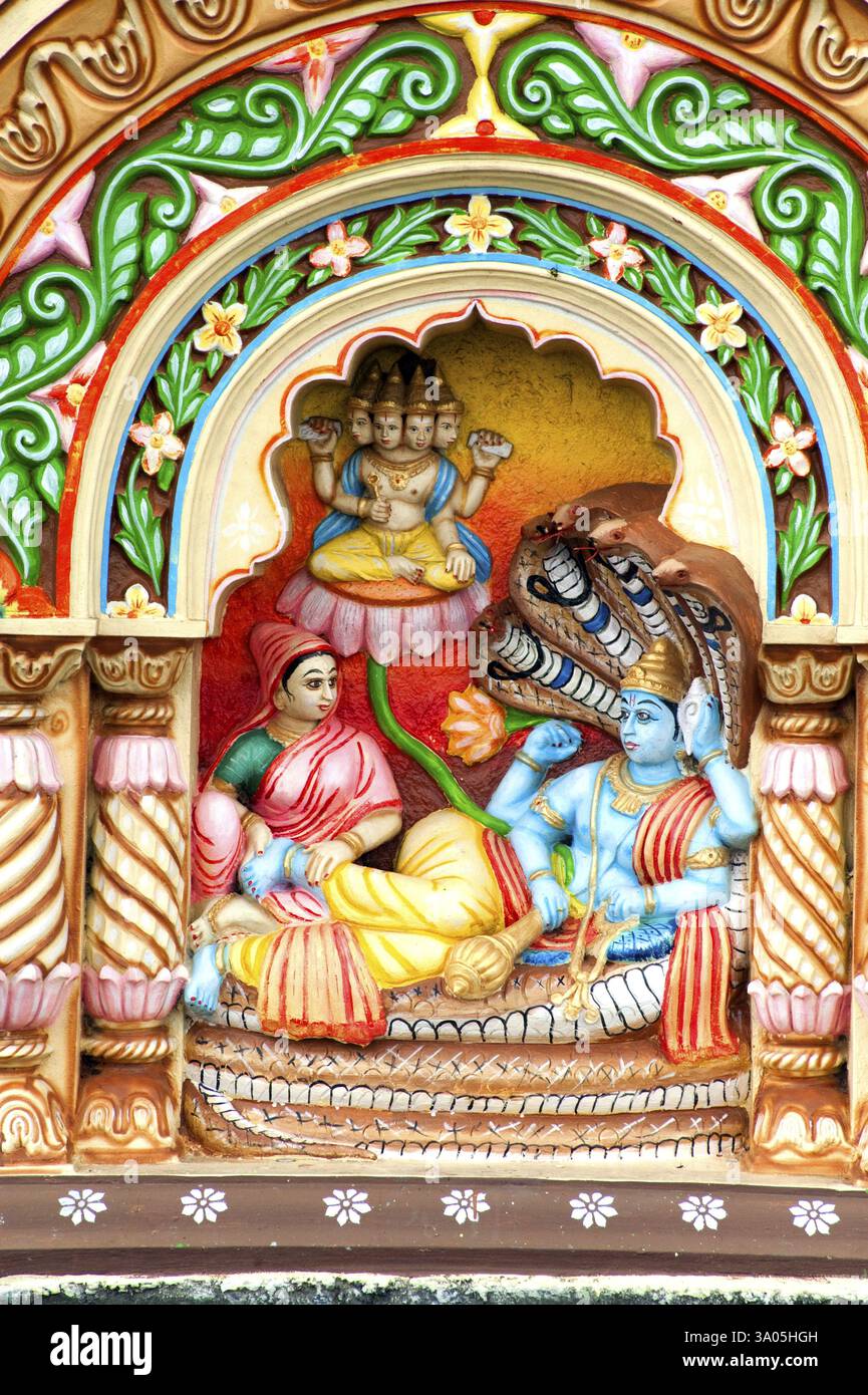 Decorative niche and relief of god datta on the wall of yamai mandir at ...