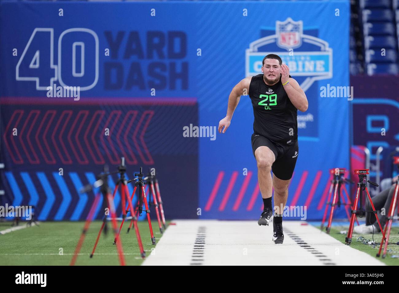 West Virginia offensive lineman Wyatt Milum runs the 40-yard dash at ...