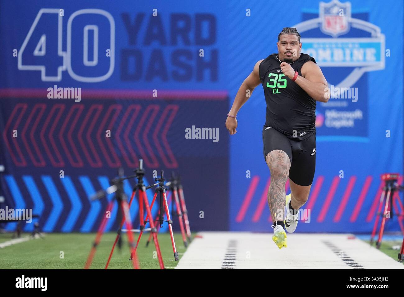 Texas Tech offensive lineman Caleb Rogers runs the 40-yard dash at the ...