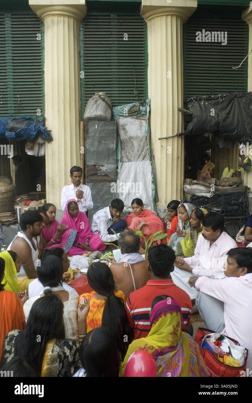 Brahmin reading scripture and performing Satya Narayan Pooja at Babu ...