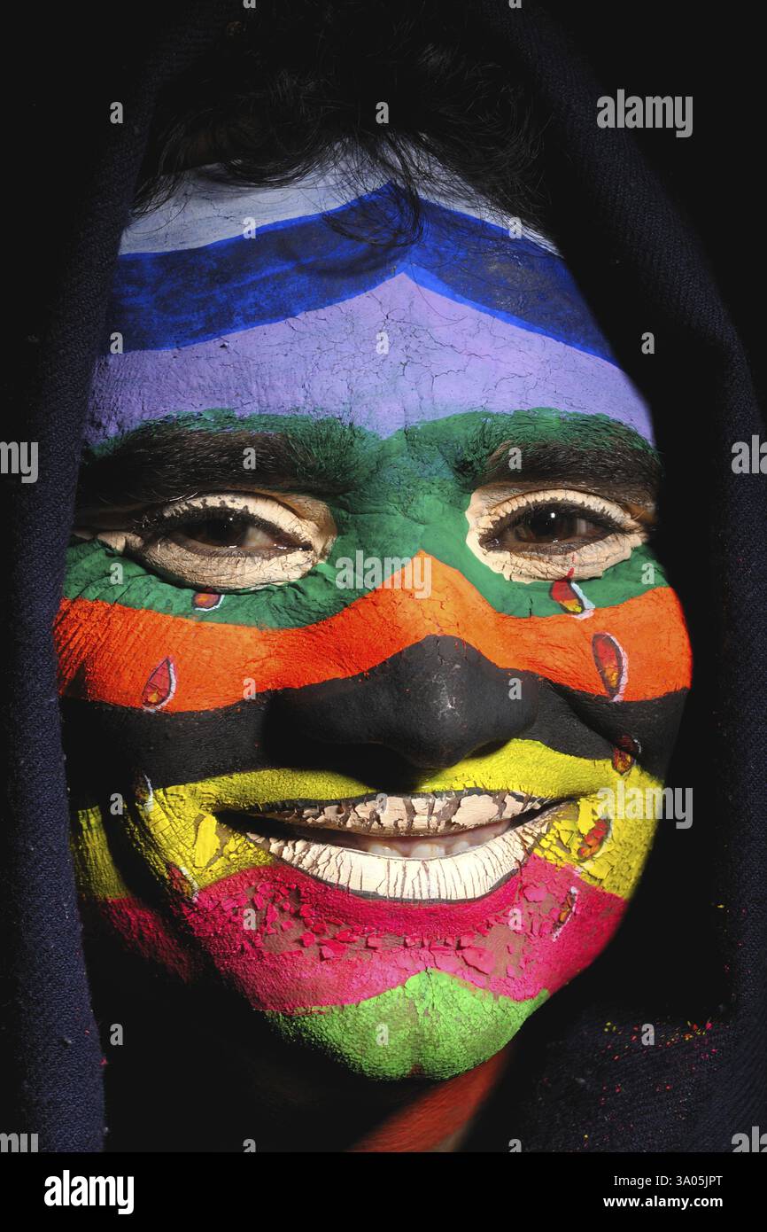 Painted face of man showing sad mood but smiling MR#769G Stock Photo ...