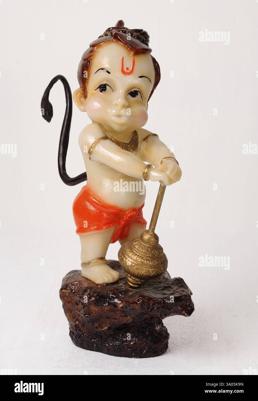 Clay statue of bal hanuman with mace Stock Photo - Alamy