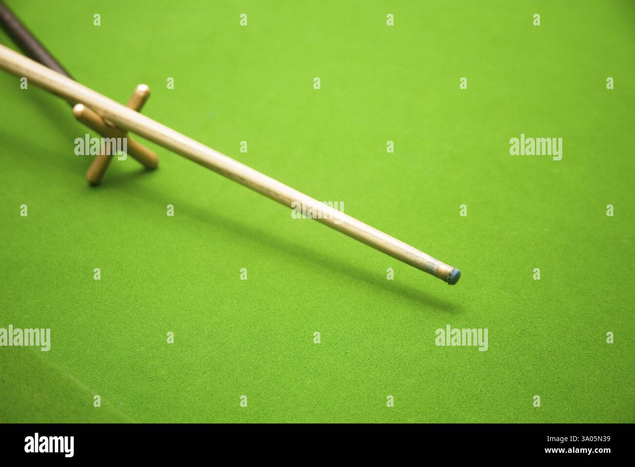 Billiard stick on support on the green table, Indoor game, Palolem ...
