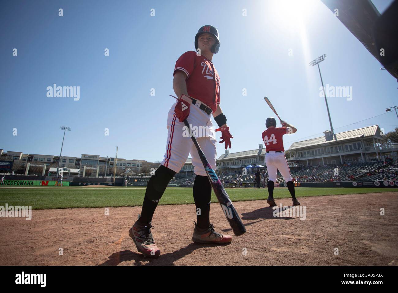 Frisco, Texas, USA. 2nd Mar, 2025. Nebraska batters warm up before a ...