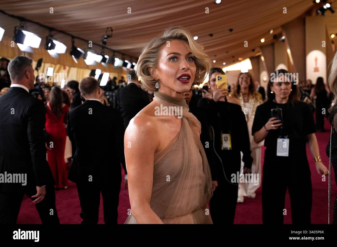 Julianne Hough arrives at the Oscars on Sunday, March 2, 2025, at the ...