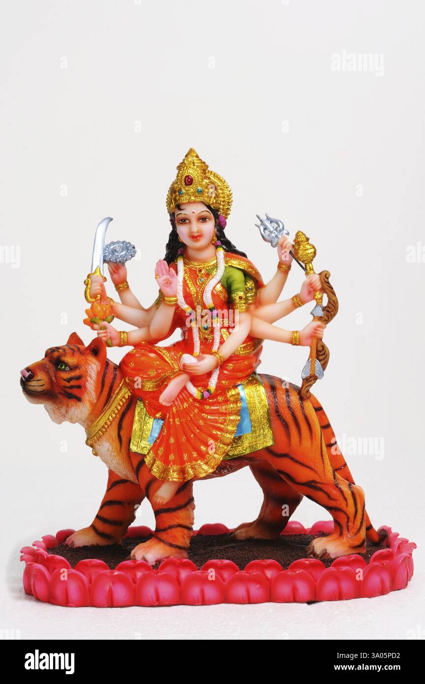 Clay statue of goddess maa durga mounted on tiger Stock Photo - Alamy